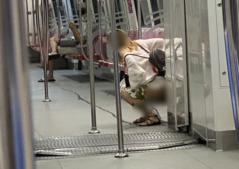 Public transport or public toilet? Woman pulls down shorts to pee on MRT train, Singapore News ...
